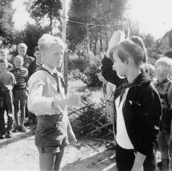 Figure 1.--Here we see German Young Pioneers saluting at sonme kind of ...