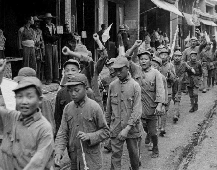 Figure 1.--Here we see a Communist military unit chanting anti-Japanese ...